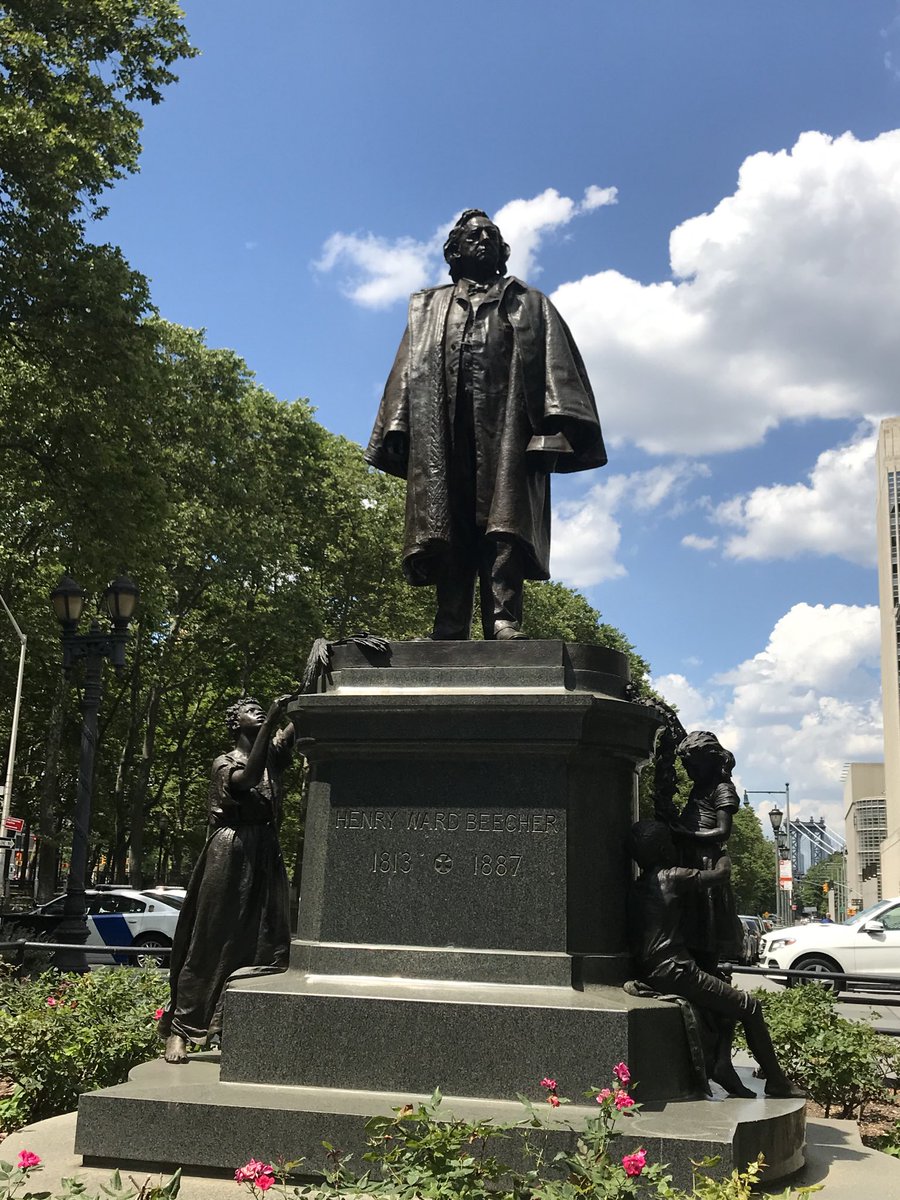 A statue stands in Brooklyn. Henry Ward Beecher, in--gasp--Columbus ...