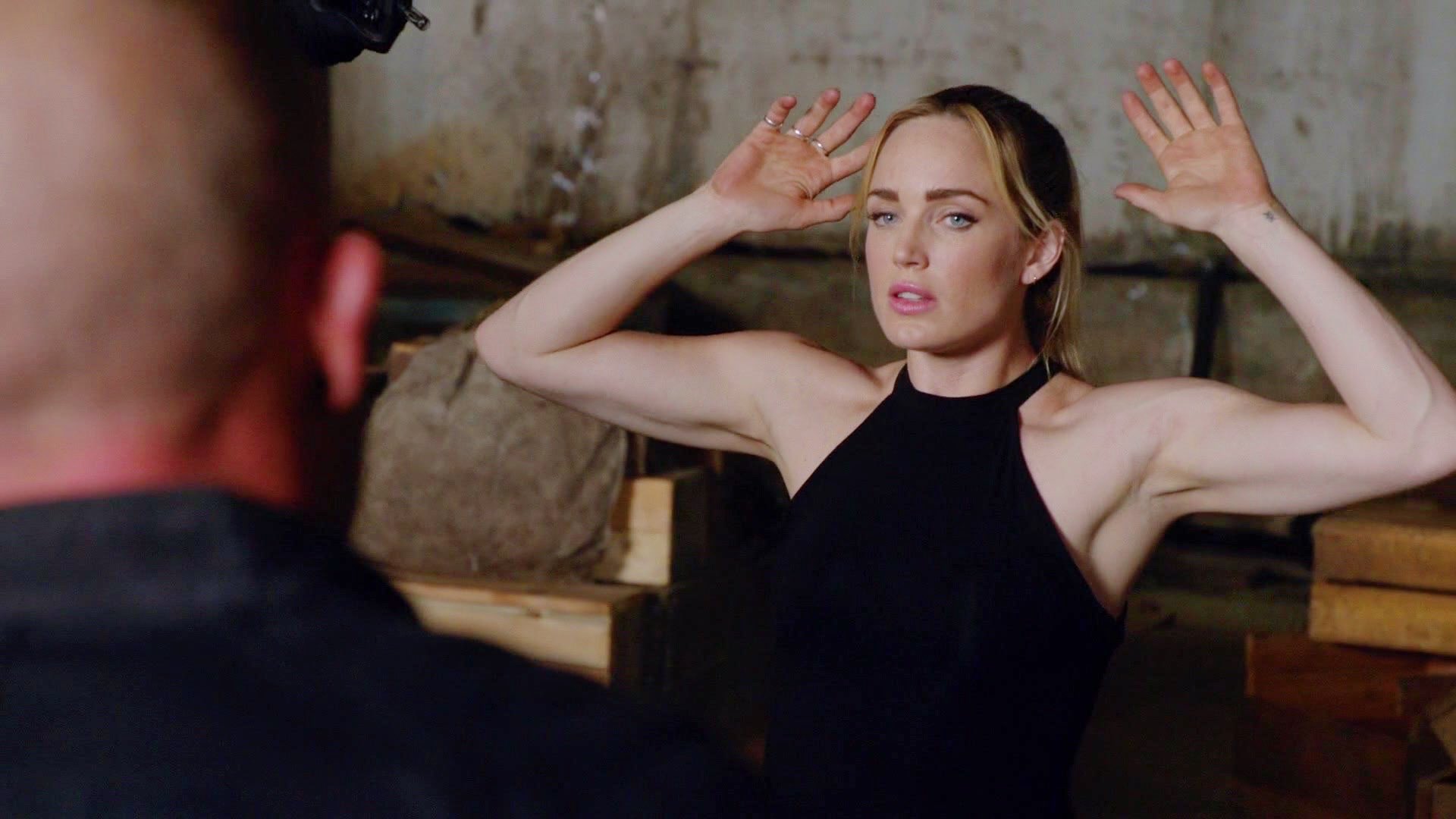 Women With Hands Up Surrender