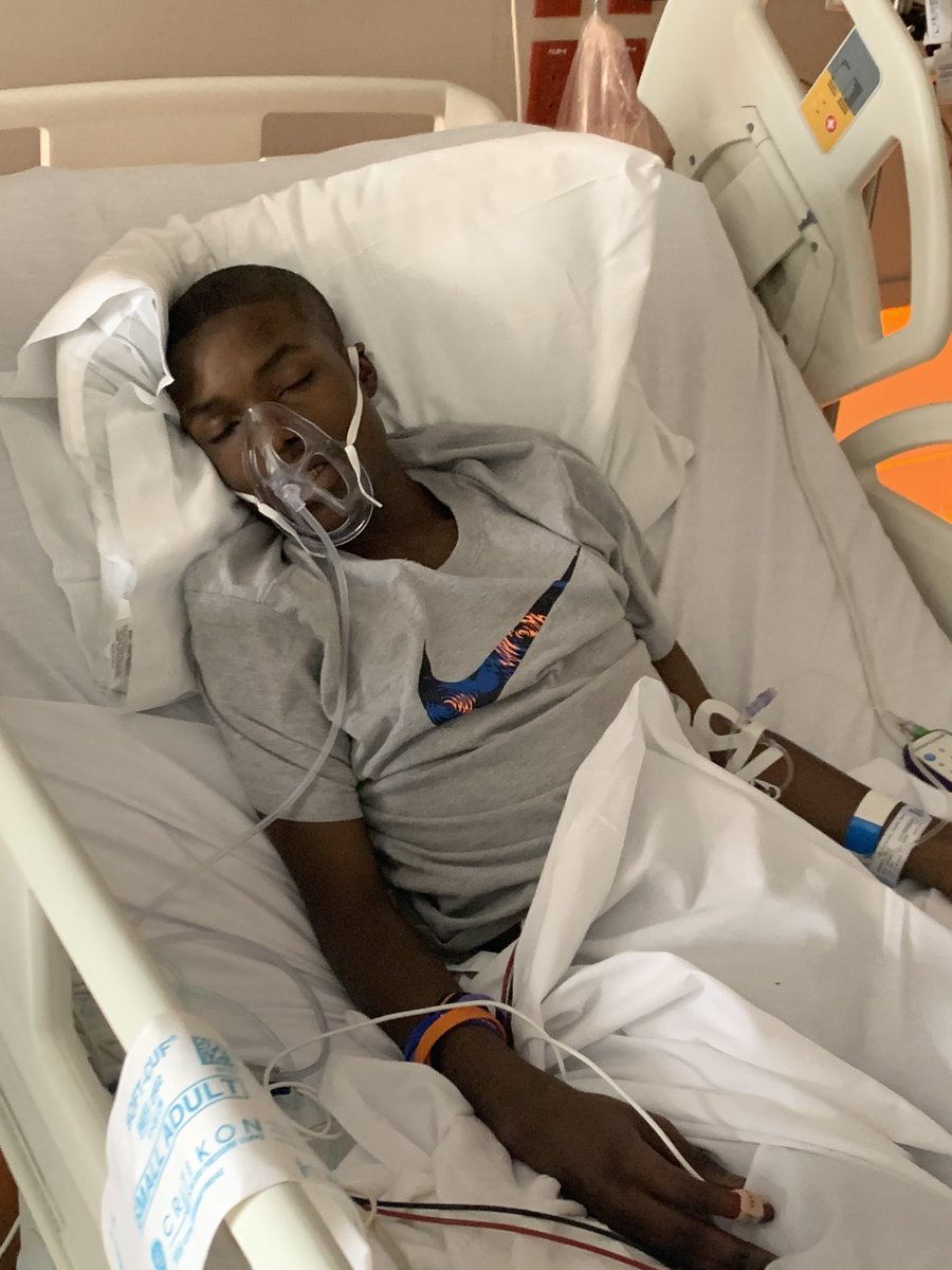 Teenager In Hospital Bed