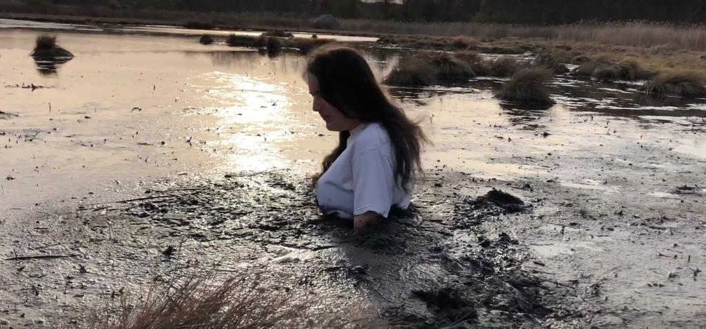 Girl Sinking In Mud