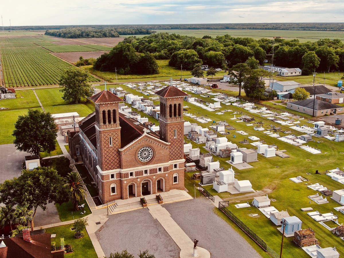 View from the Mississippi river of St John the Baptist Catholic church ...