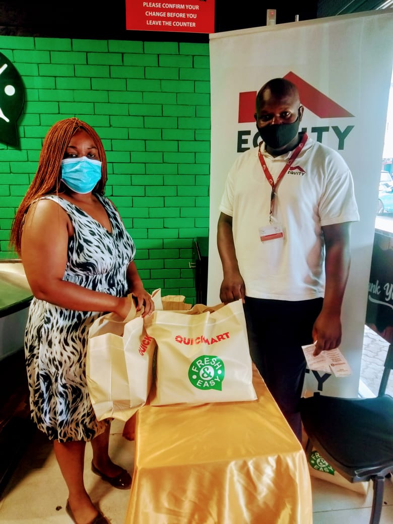 Equity Bank Kenya on Twitter: "Nelly Achieng Kirowo receives a hamper from Daniel Okiomeri ...