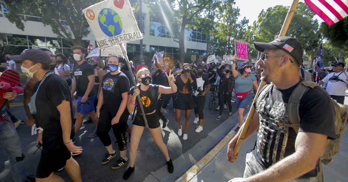 Racism, QAnon and 'cold civil war': Inside the 20,000-strong Defend ...