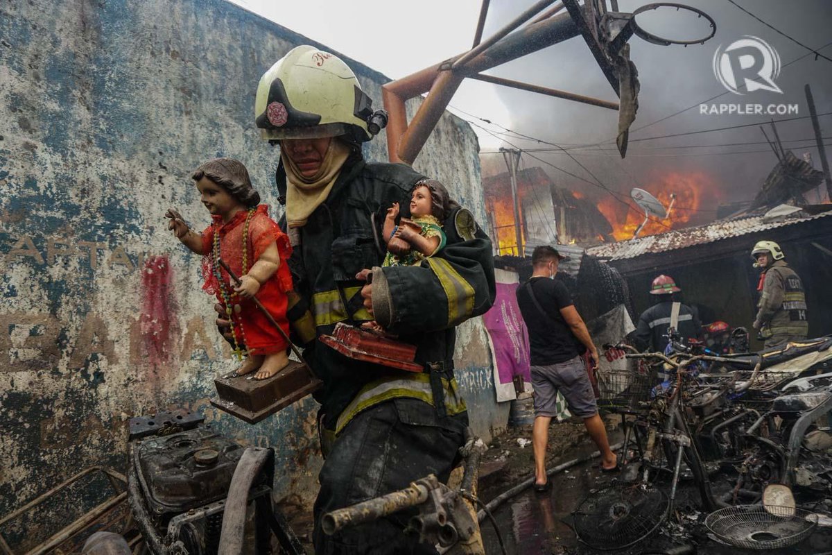 LOOK: Firefighters extinguish a fire at a residential area in Barangay ...