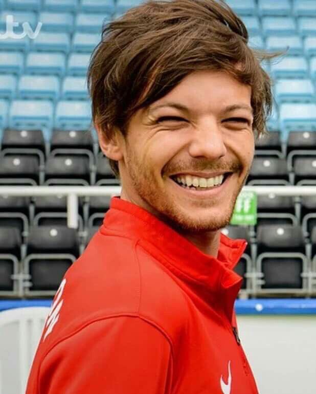 Louis Tomlinson Smiling