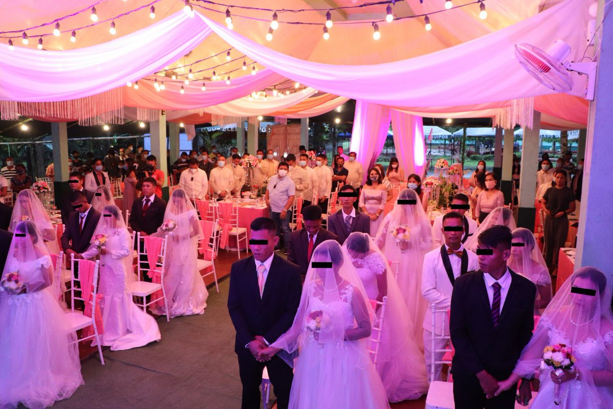 LOOK: Twelve couples who are former NPA rebels tie the knot in a joint ...