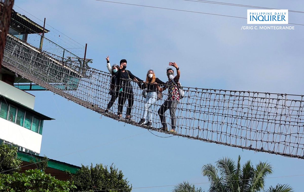 LOOK: Locals climb the hanging bridge of the 360 degree view deck at ...