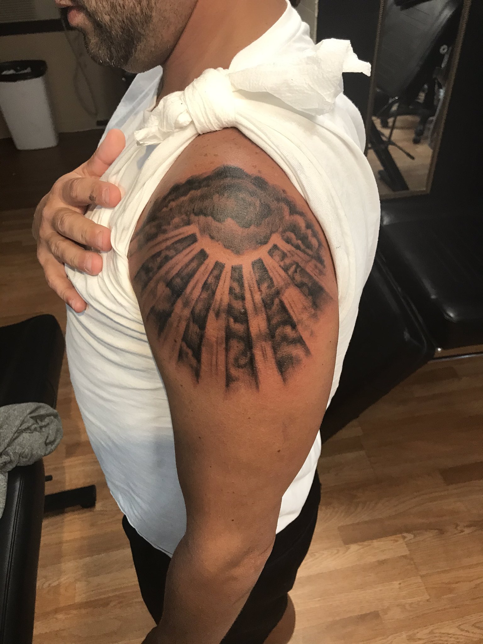 Sun Rays On Shoulder Tattoo