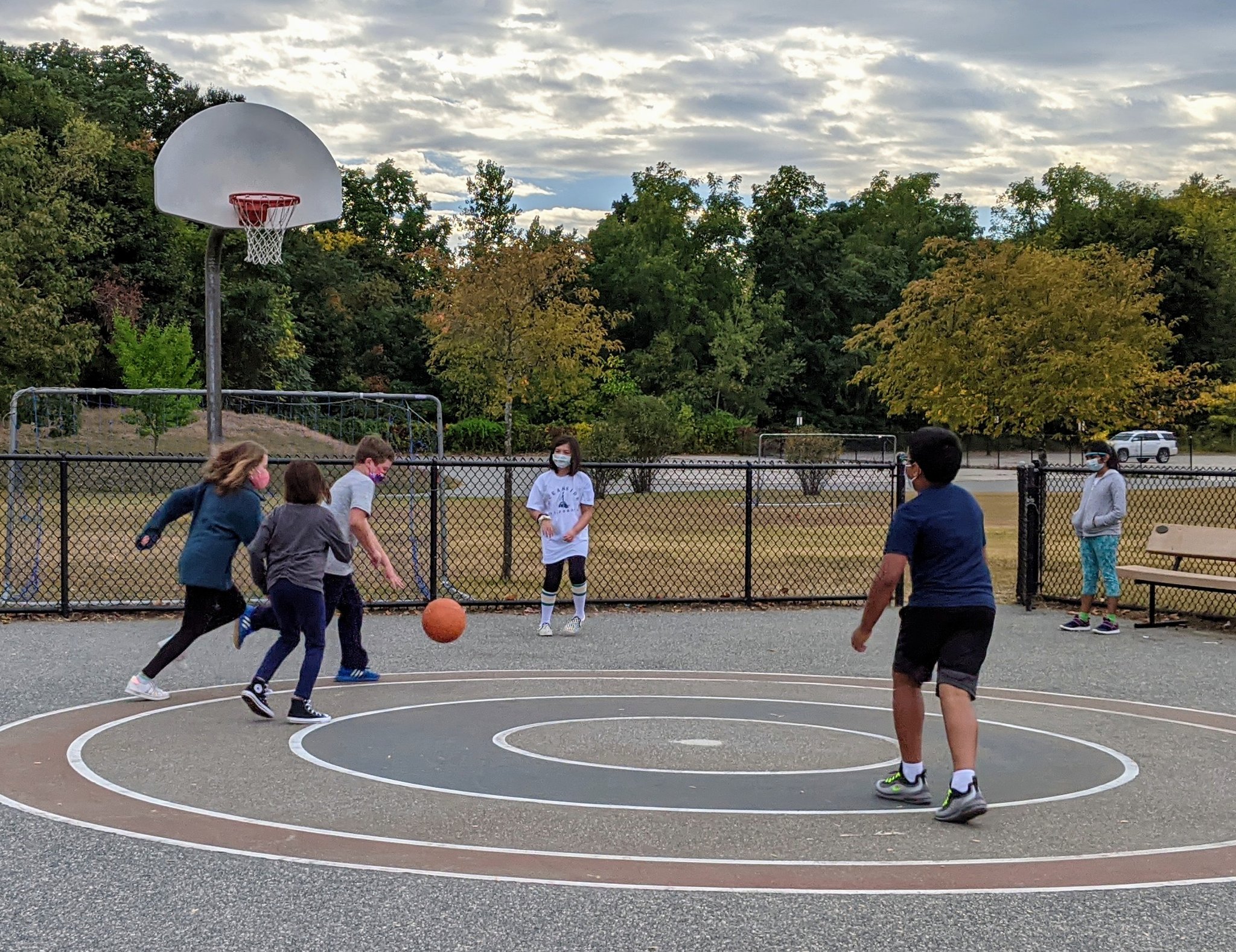 Kids Playing Basketball At Recess