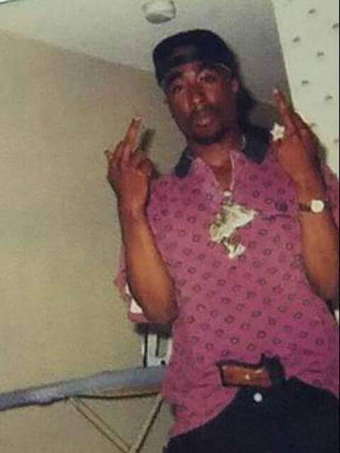 Tupac Holding A Gun