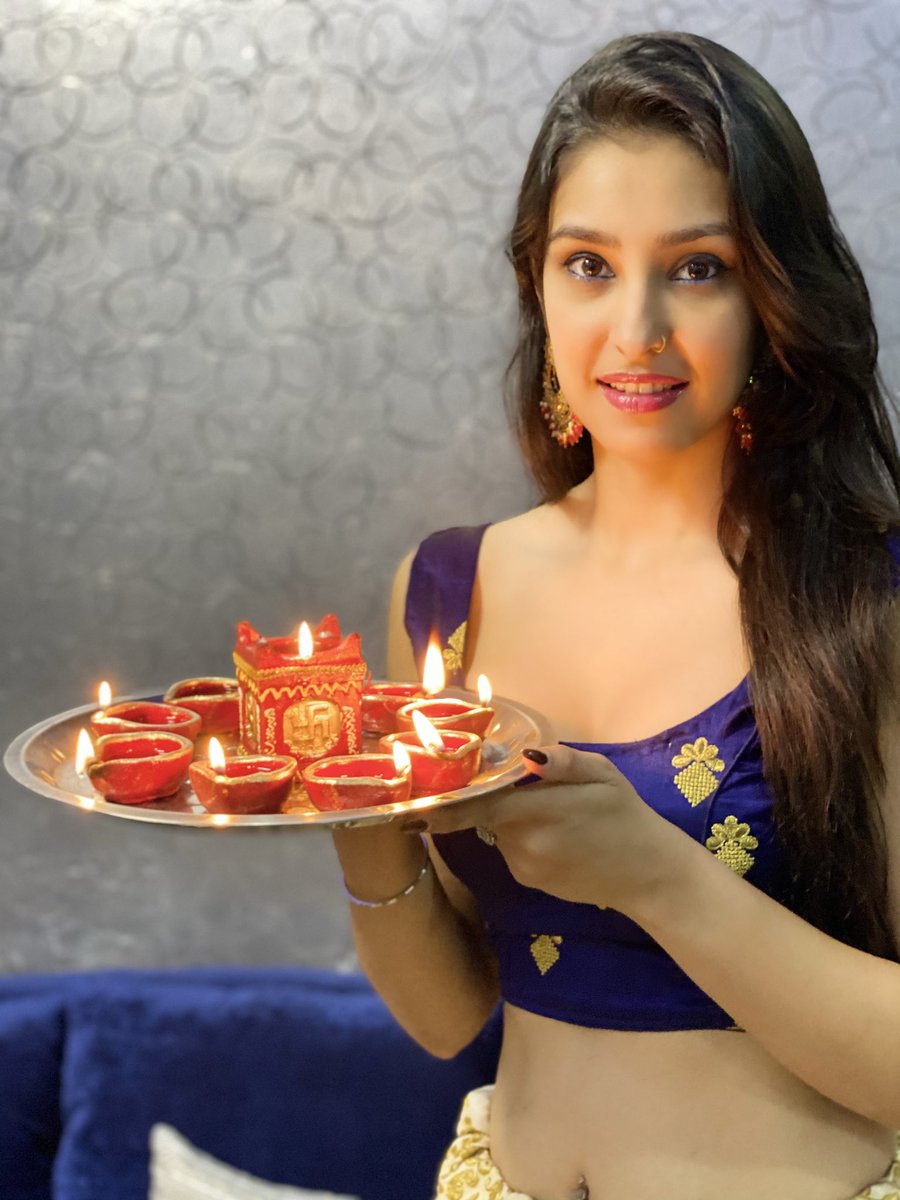 Navneet Kaur In Orange Saree