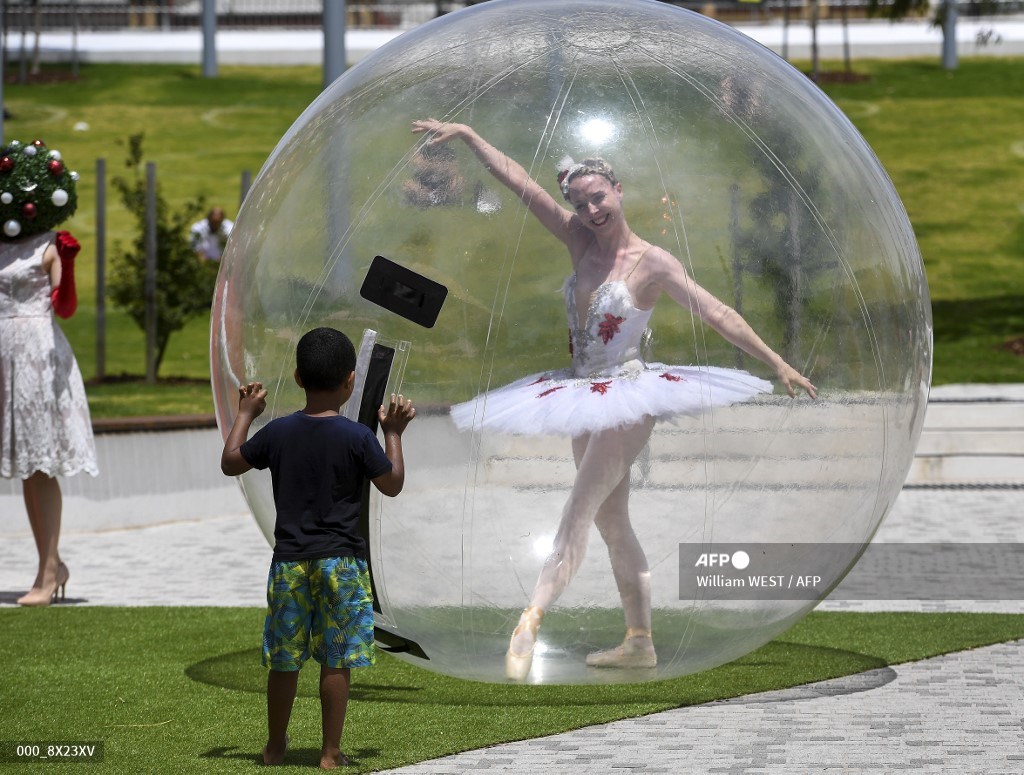 Girls In Giant Plastic Bubble