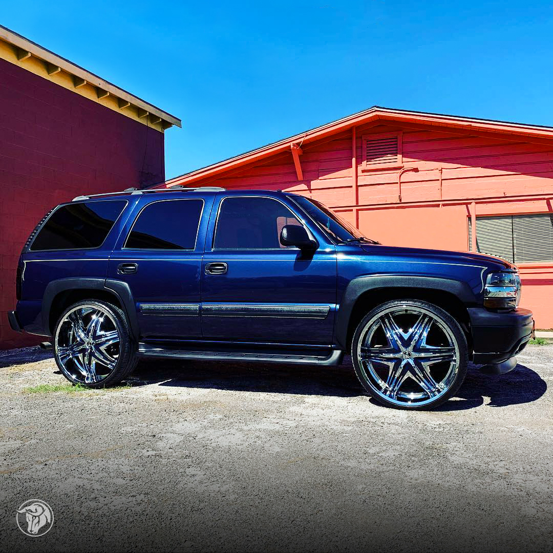 Blue Chevrolet Tahoe On 24s