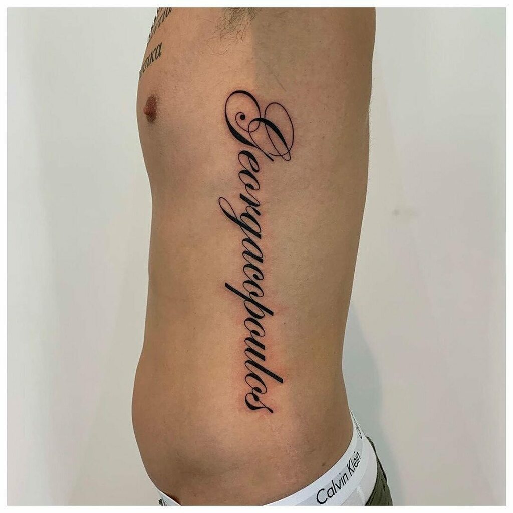 Cursive Tattoo On Forearm