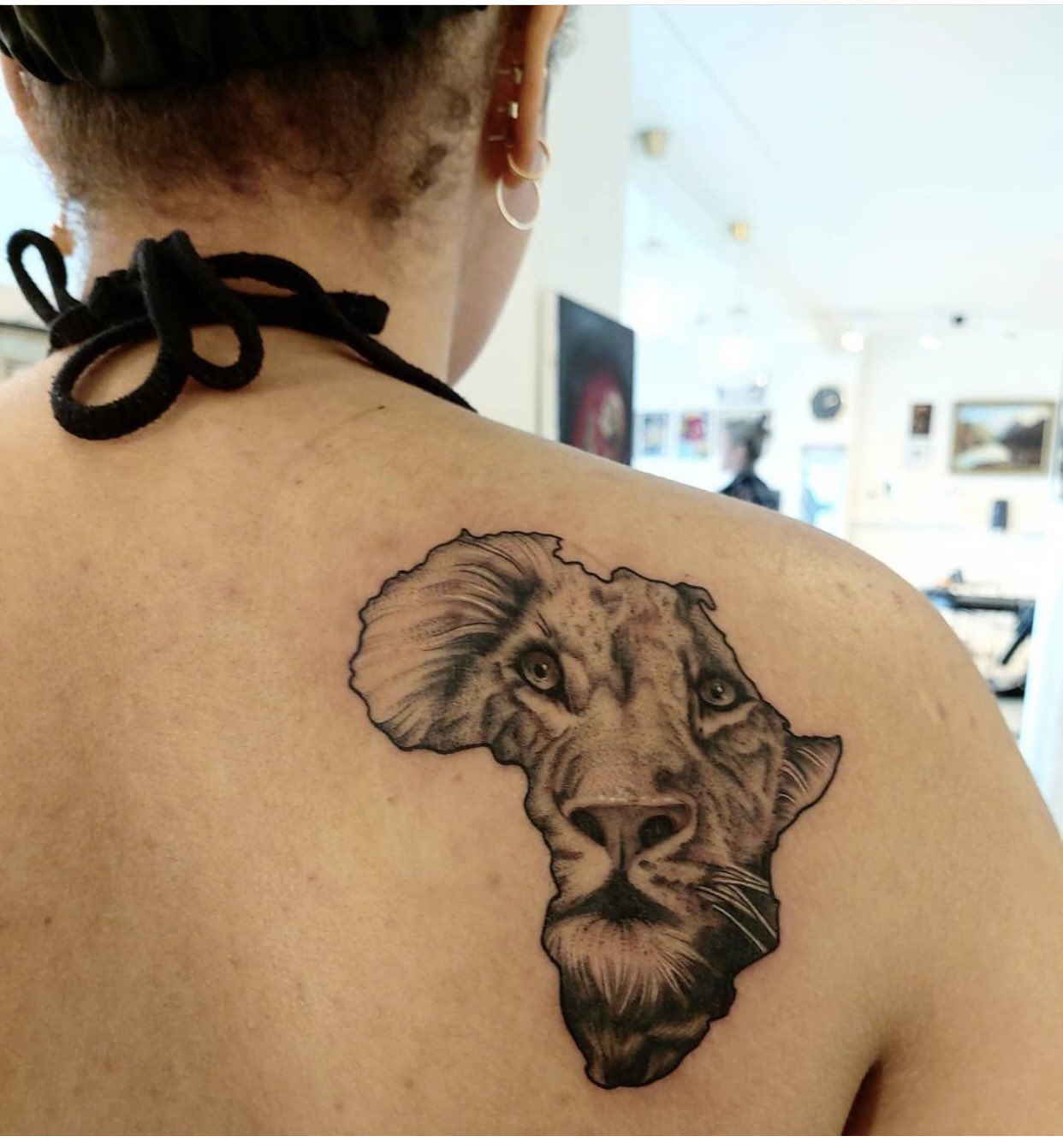 Africa Map With Lion Tattoo