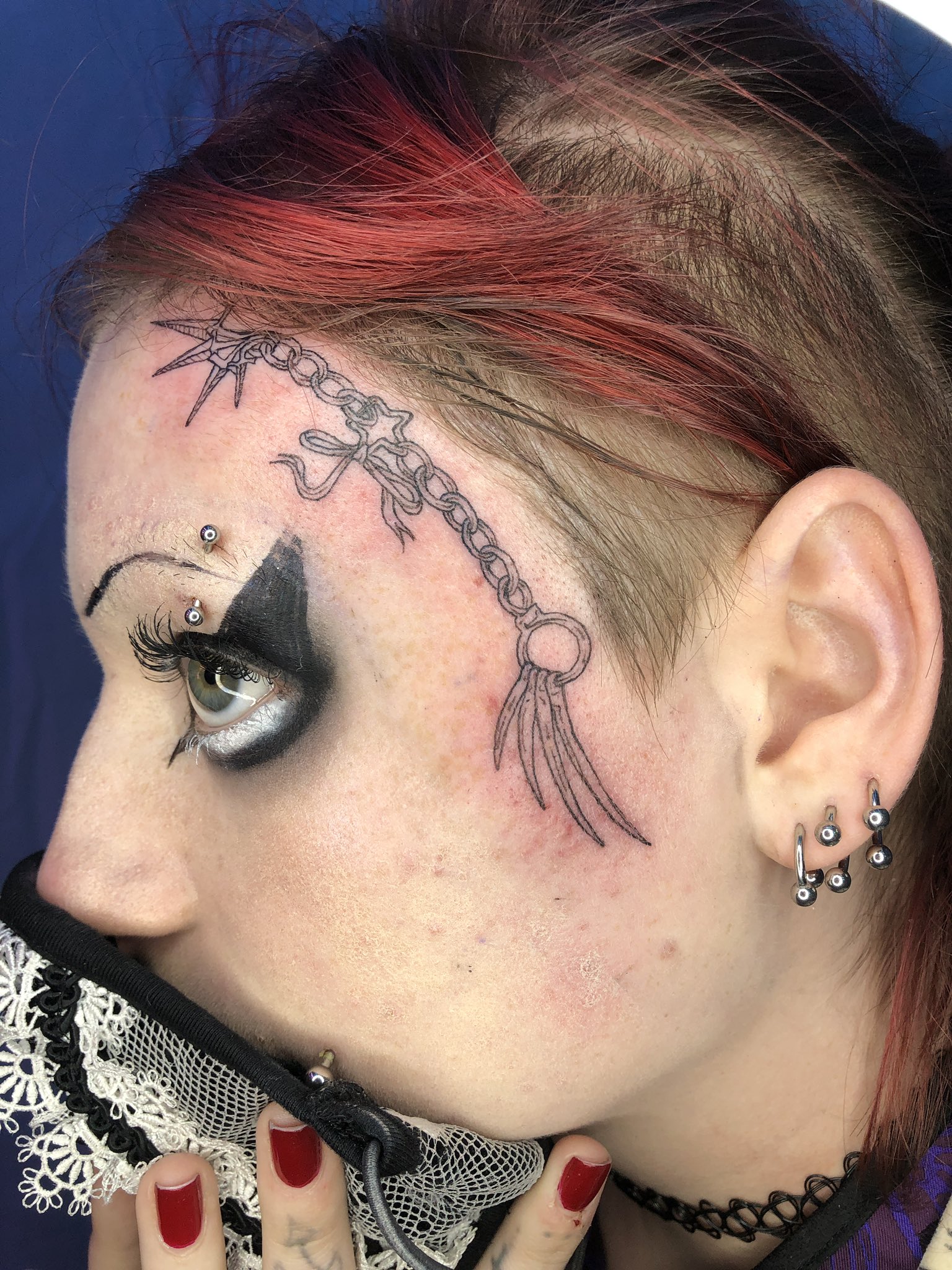 Goth Face Tattoo