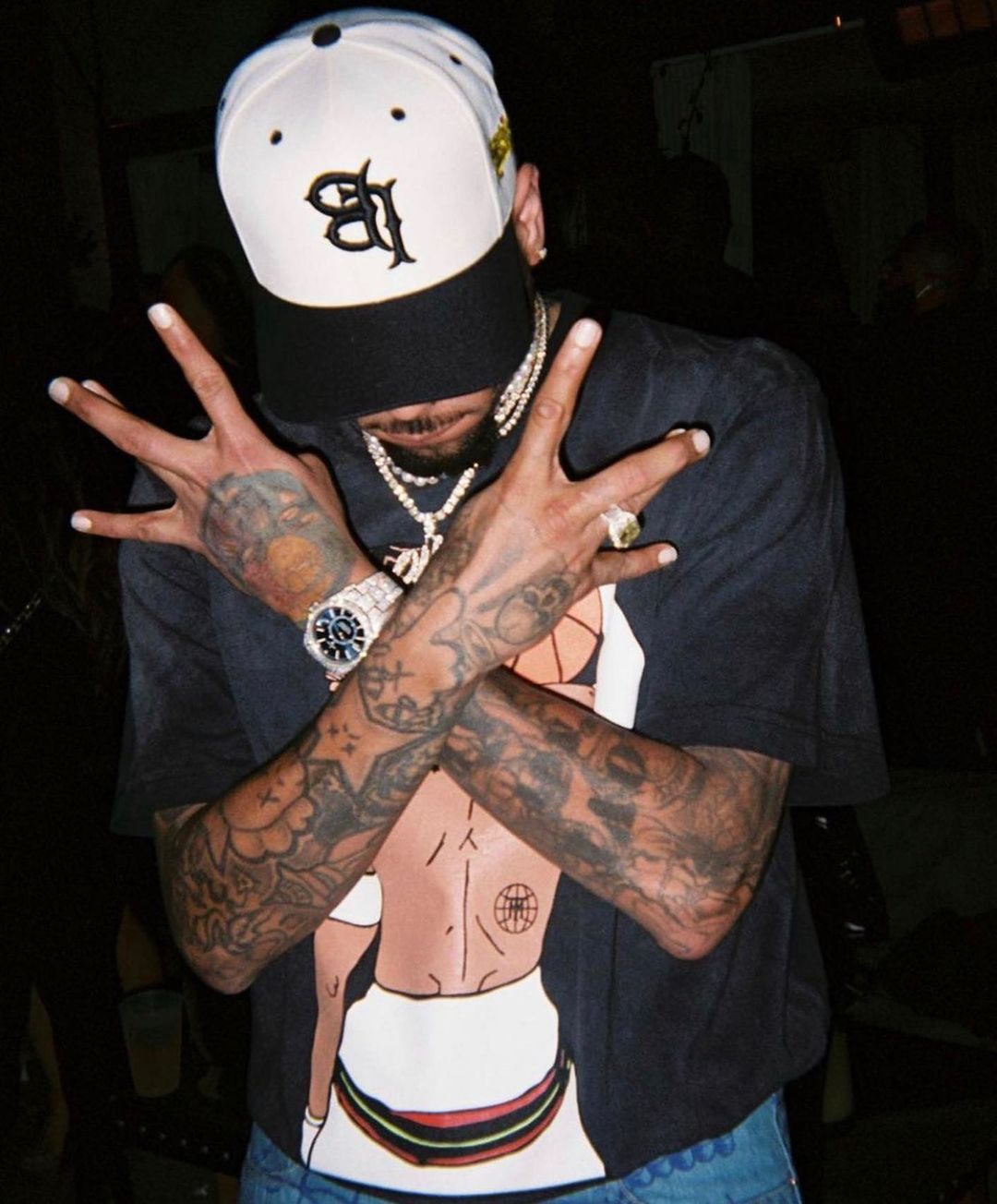 Chris Brown Left Hand Tattoo