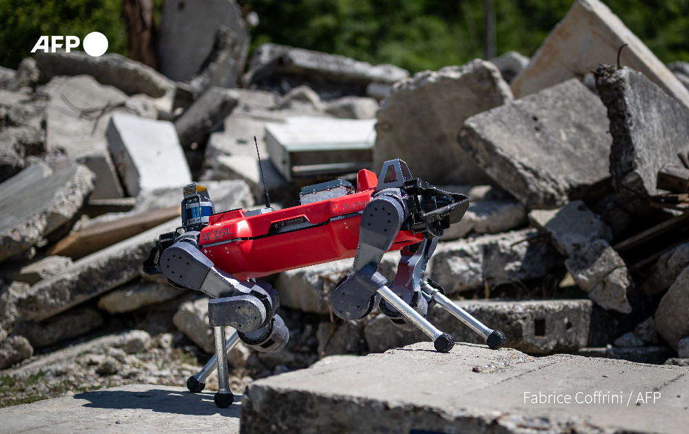AFP News Agency on Twitter: "Search and rescue robots. @AFP’s Fabrice Coffrini photographs ...
