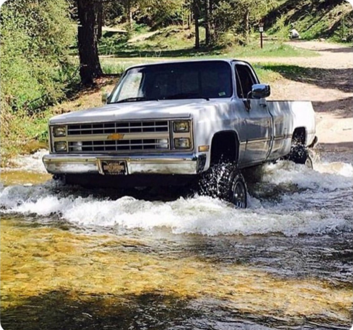 Lifted Chevy Mudding Trucks Wallpaper