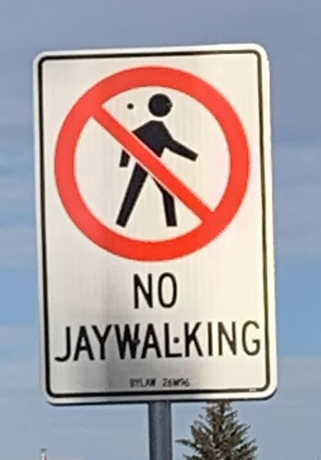 No Jaywalking Sign