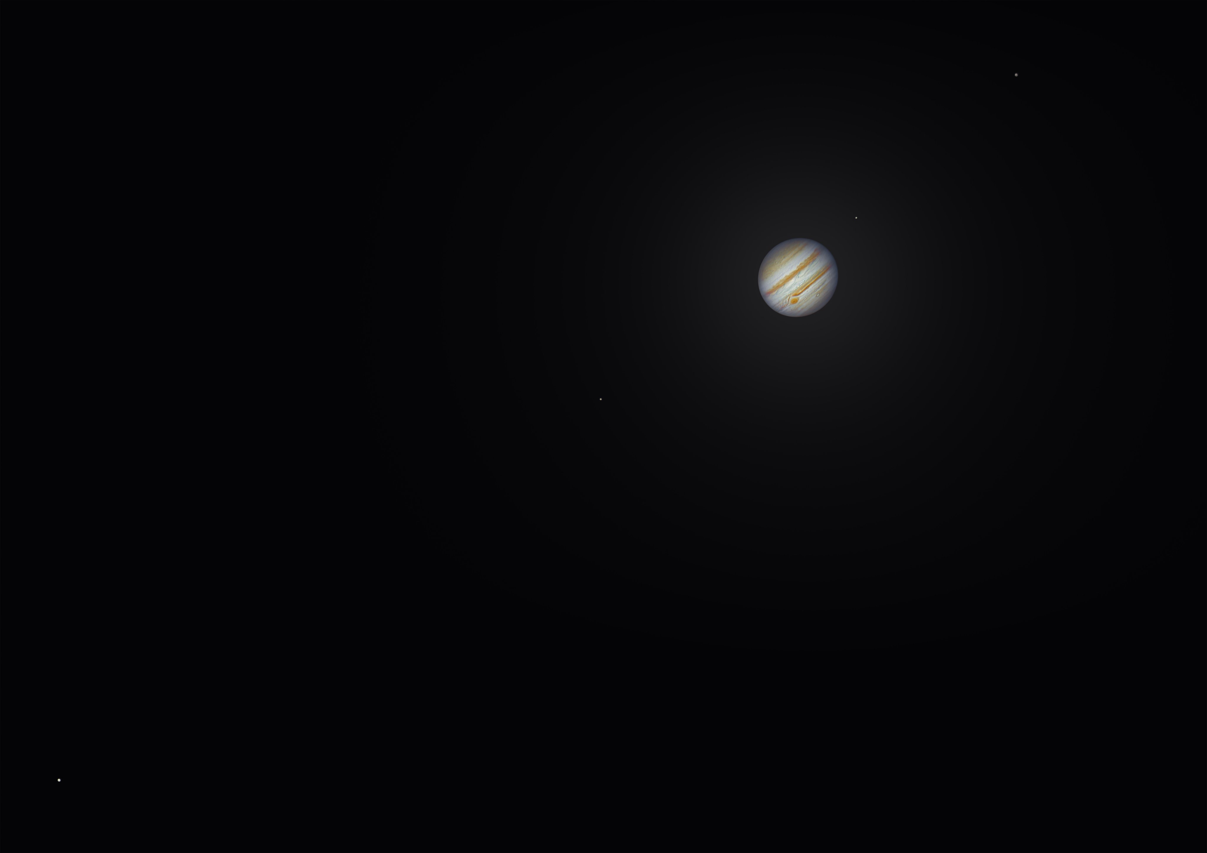 Jupiter And Moons Through Telescope
