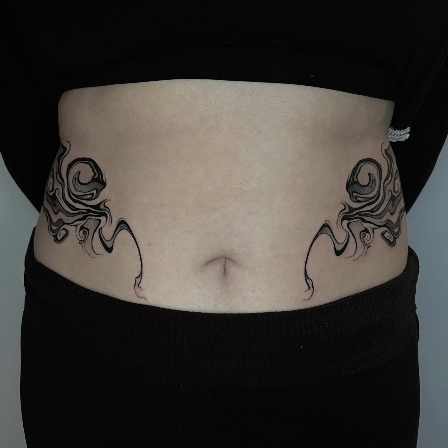 Swirl Hip Tattoos