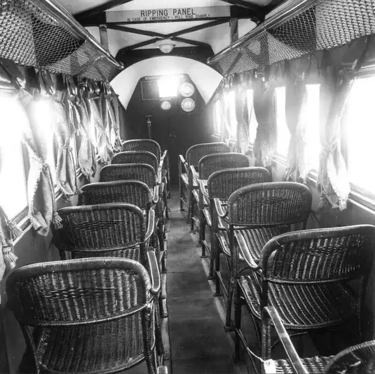 The inside of a commercial airplane in 1930. Under the ripping panel it ...