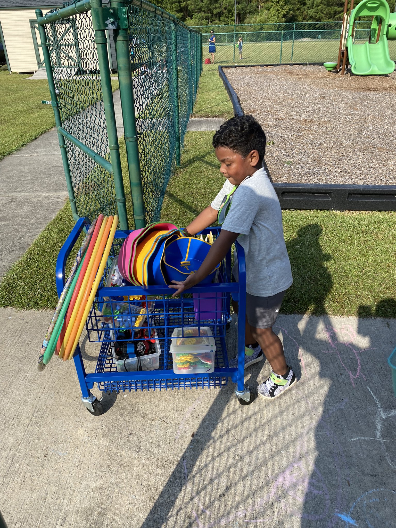 Children Cleaning Up Classroom