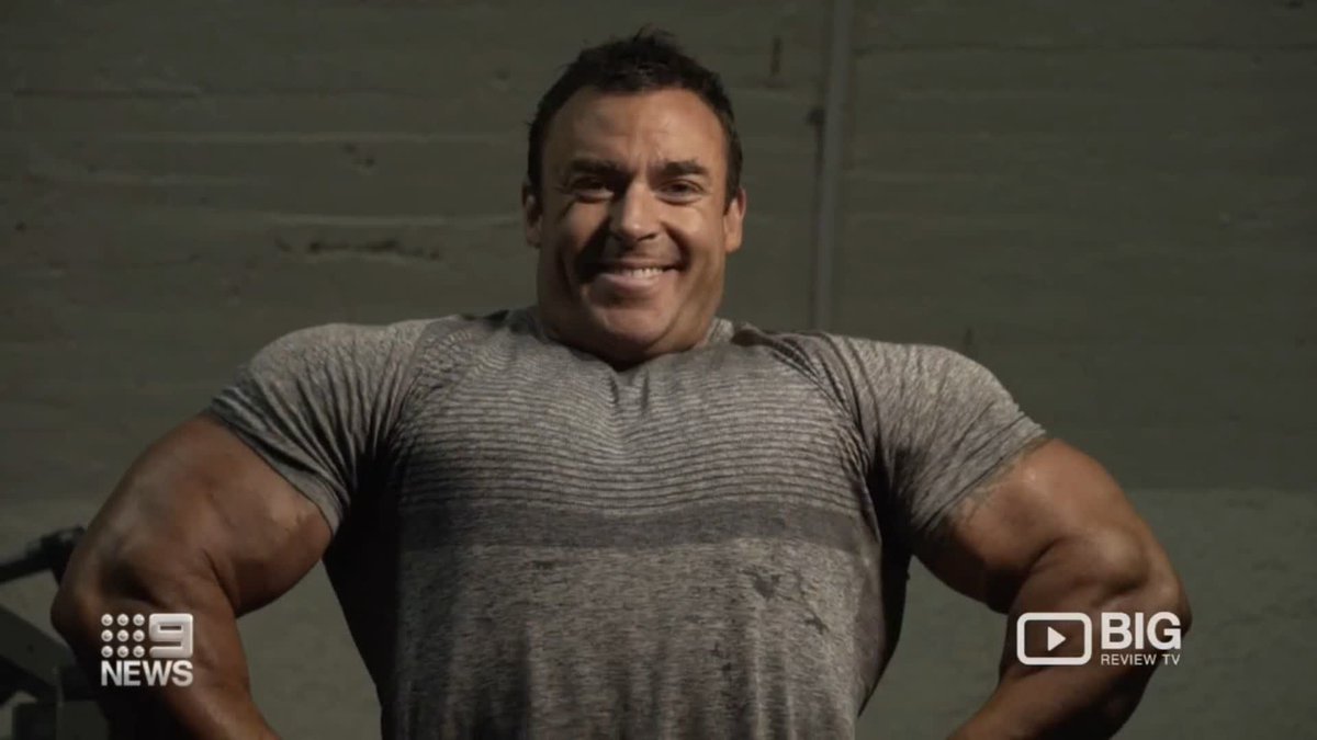 A bodybuilder who went viral as the buff security guard at the Brownlow ...