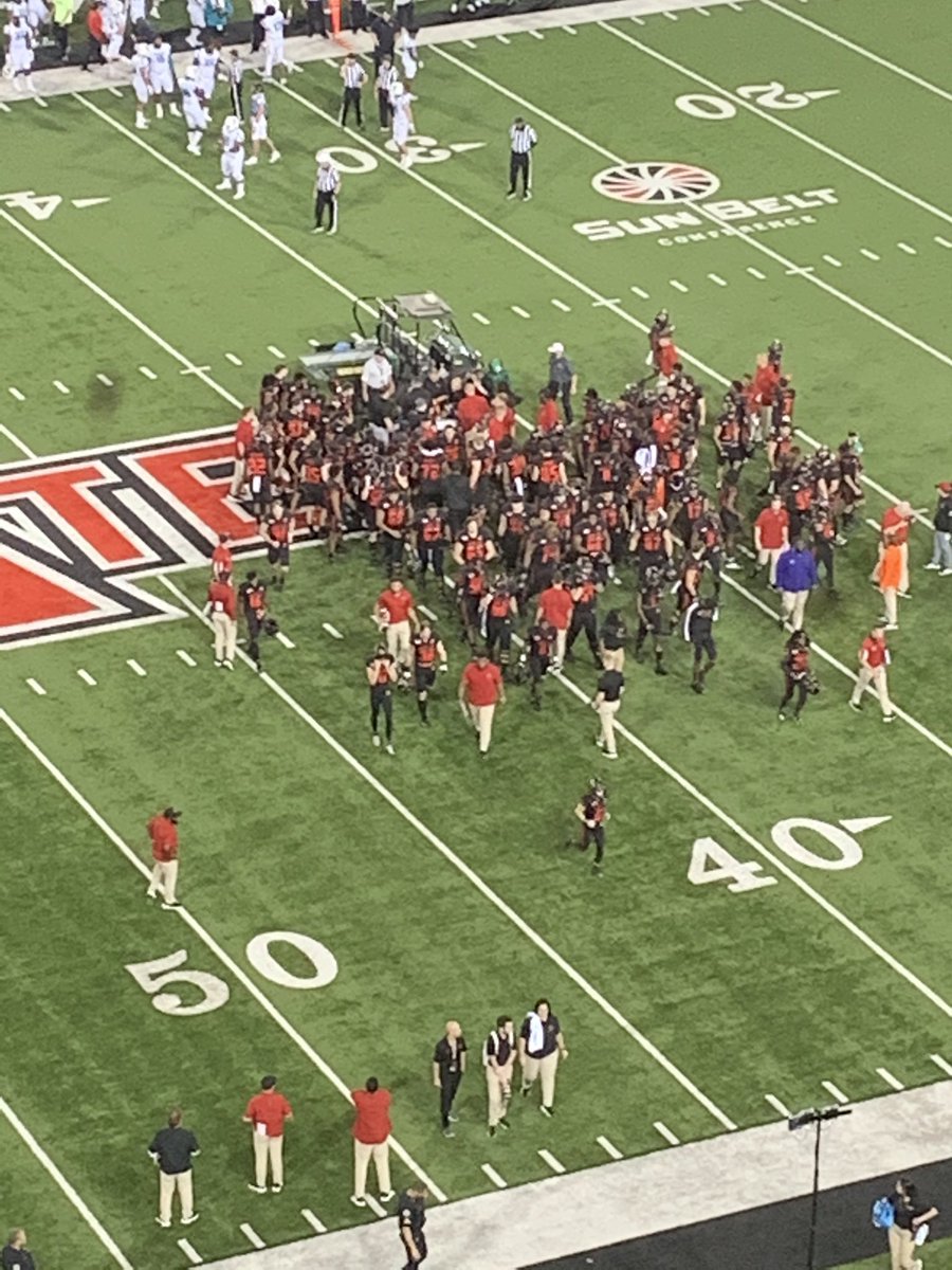 [AStateNation] Samy Johnson is loaded on ambulance. Team gathers by ...