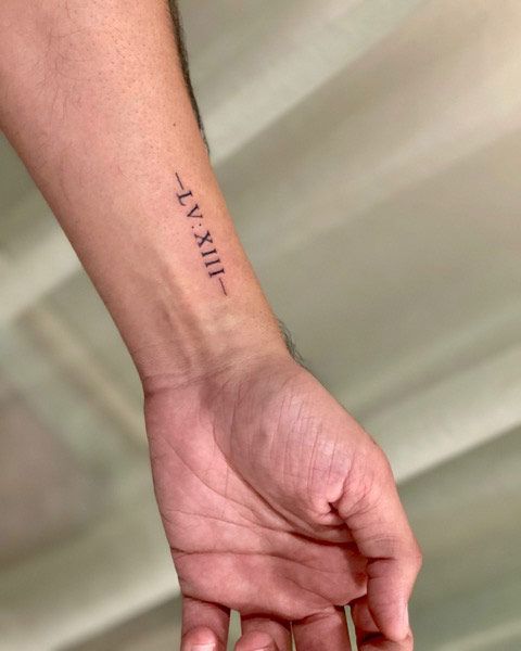 Roman Numeral 5 Tattoo On Wrist