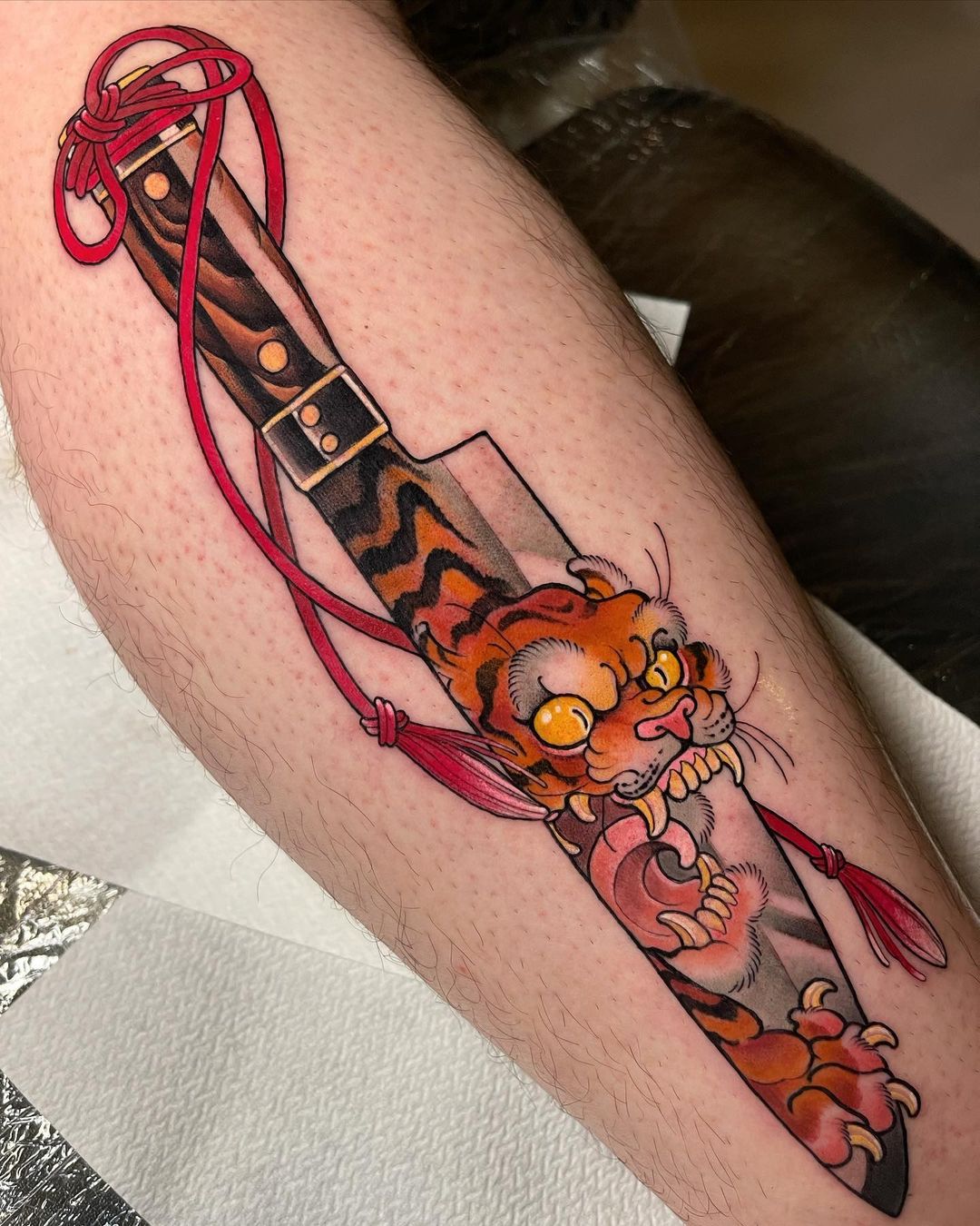 Traditional Tiger Head Dagger Tattoo