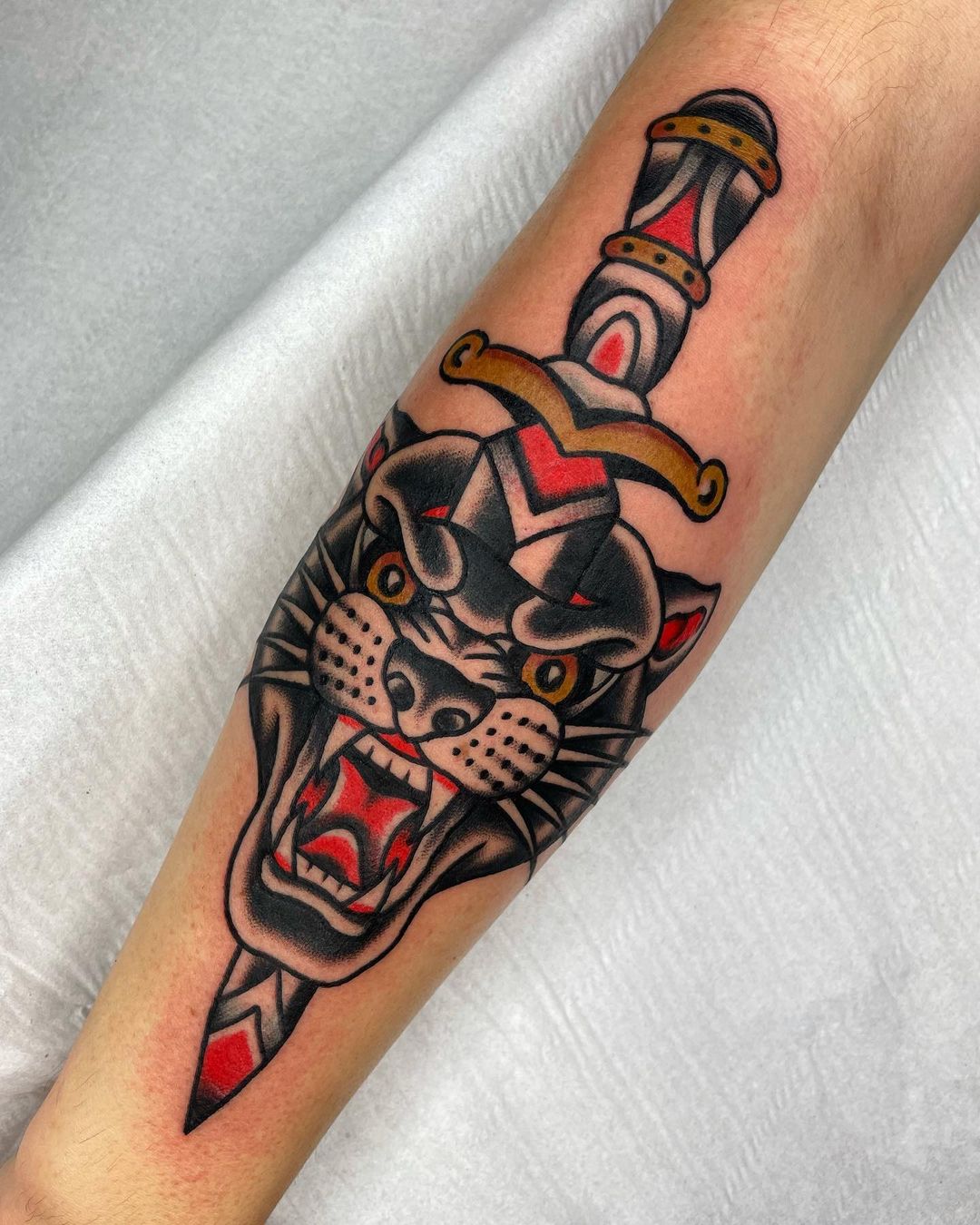 Traditional Panther With Dagger Tattoo