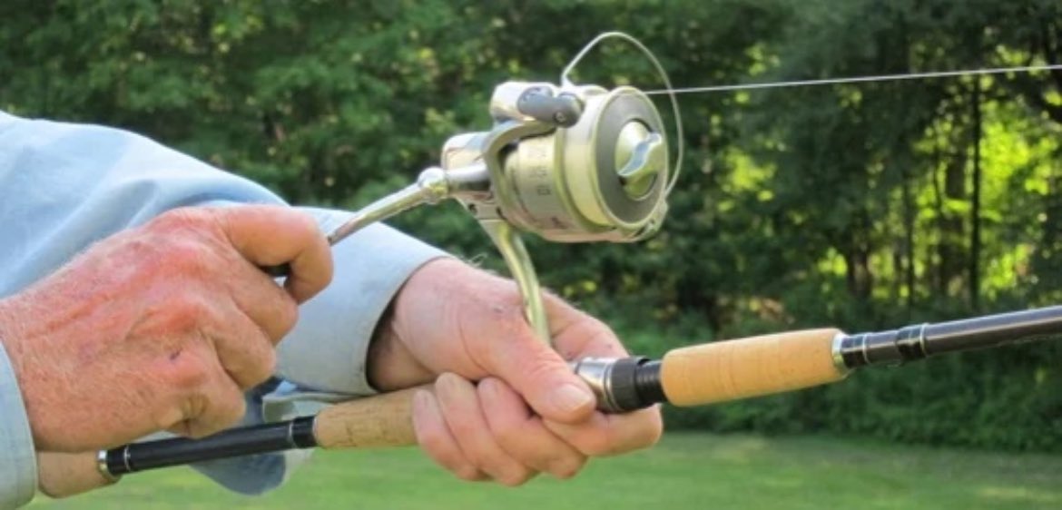 What's with all the down-locking spinning reel seats? - Rod Building Forum - SurfTalk