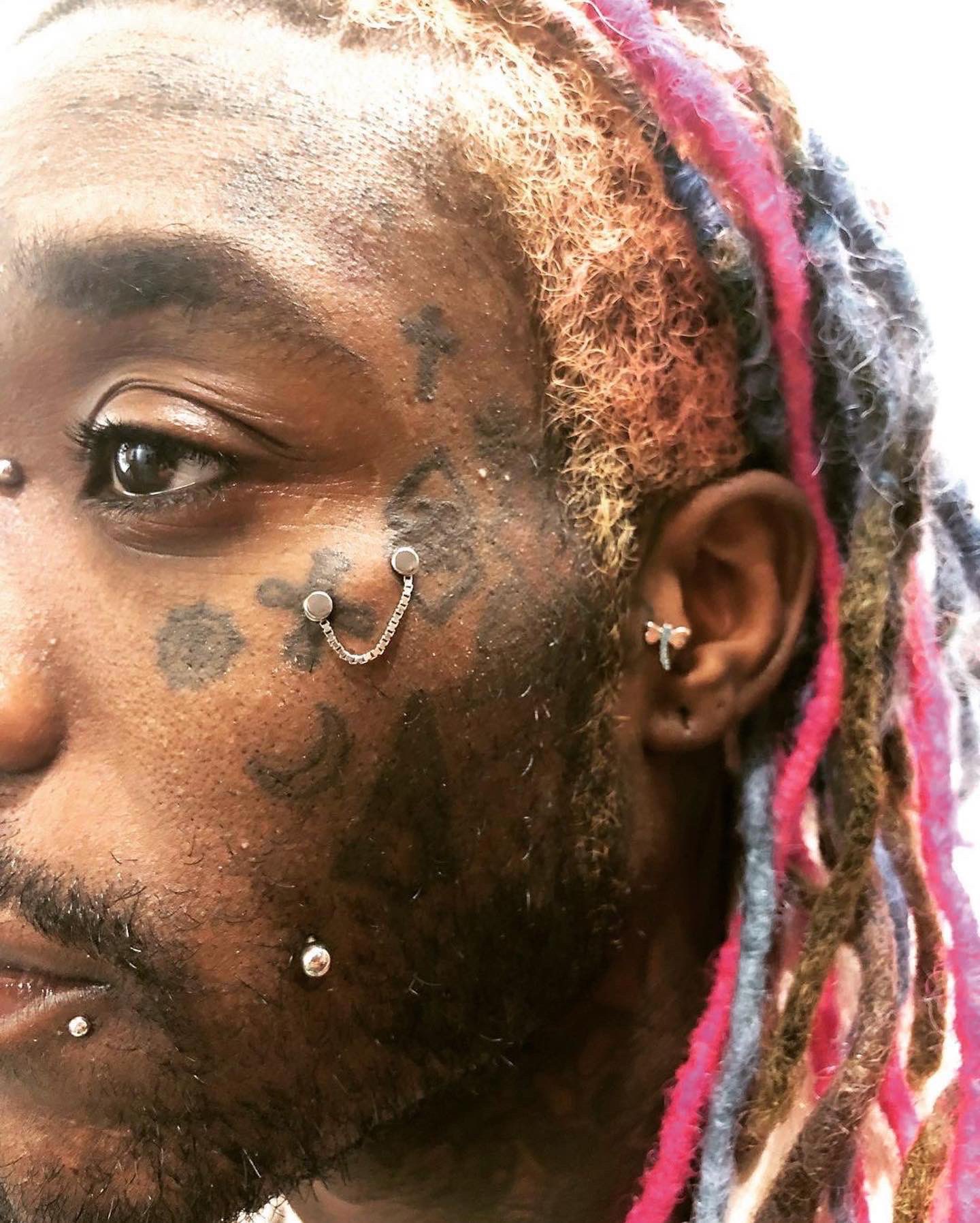 Uzi Face Tattoos