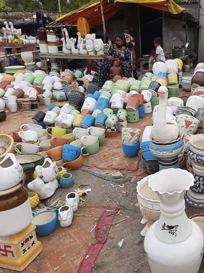 These ceramic (local) flower pots are openly being displayed on road ...
