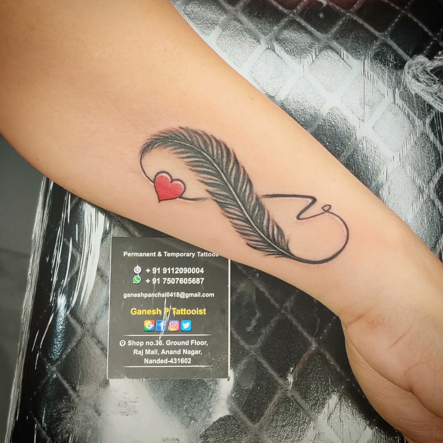 Infinity Tattoo Designs With Feather