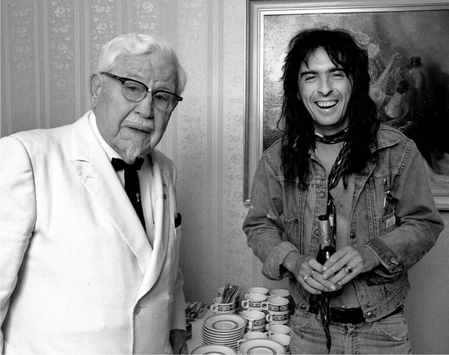 Alice Cooper serving food to children in need at his restaurant, Alice ...