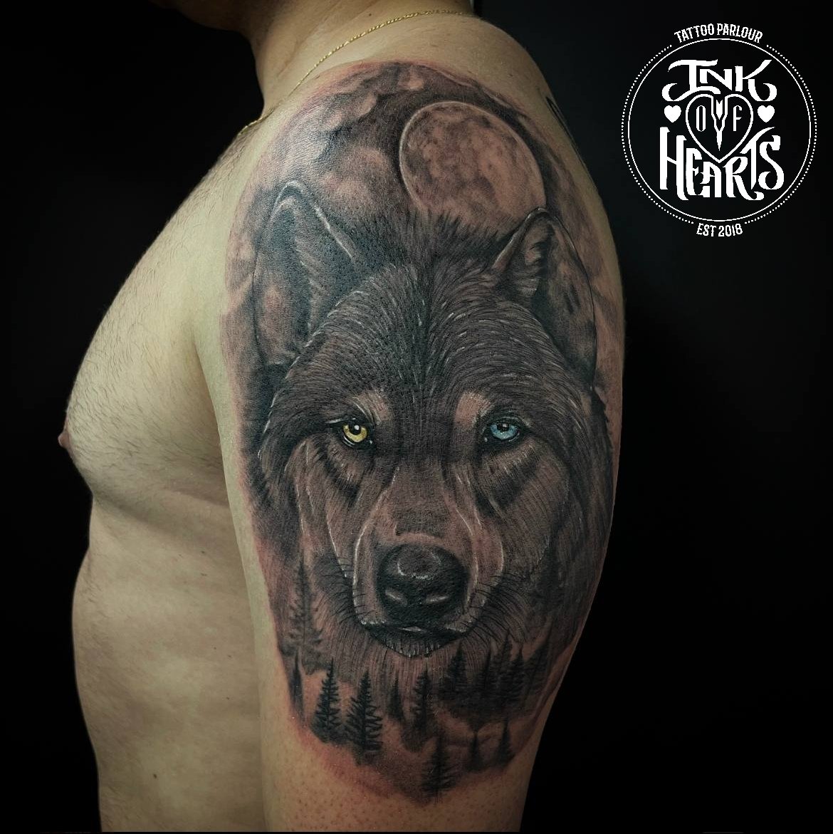 Realistic Wolf Pack Tattoo
