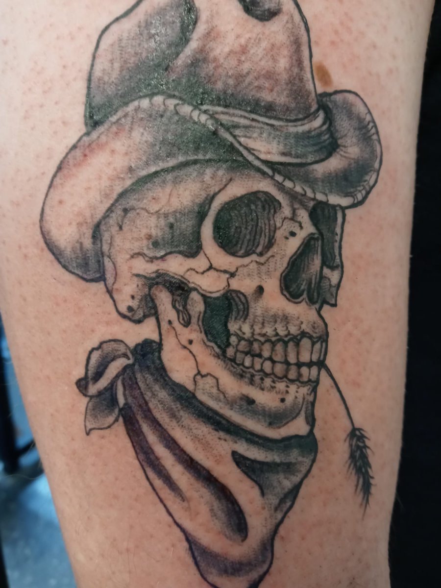 Skull With Snapback Tattoo