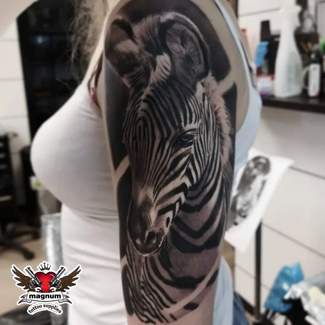 Zebra Man Tattoos Elvis Riding A Zebra. #elvispresley #zebra