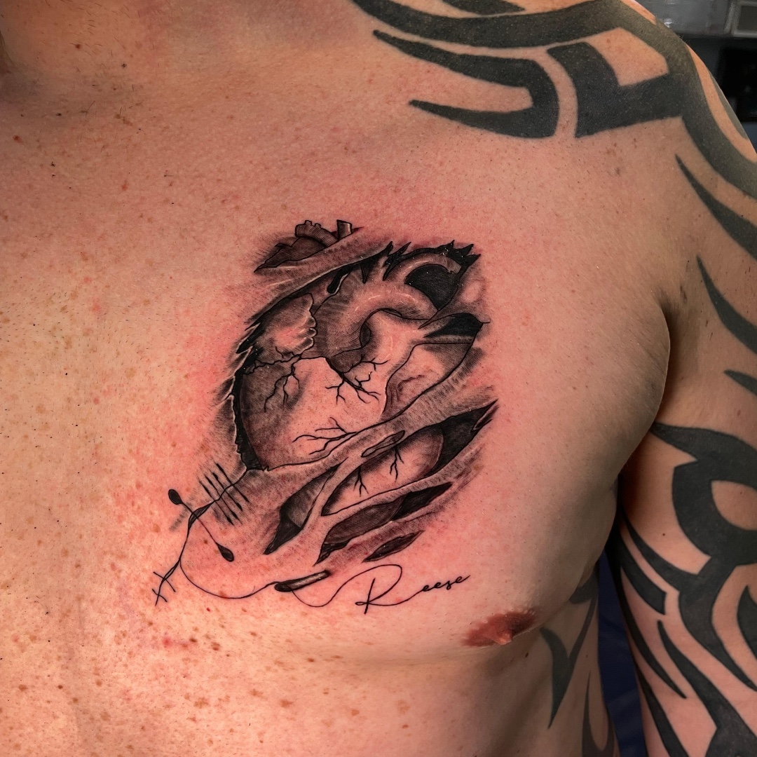 Ripped Skin Tattoo Shoulder