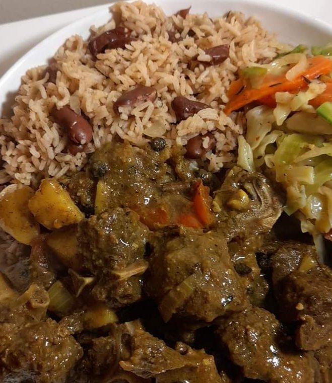 Rice And Peas And Curry Goat