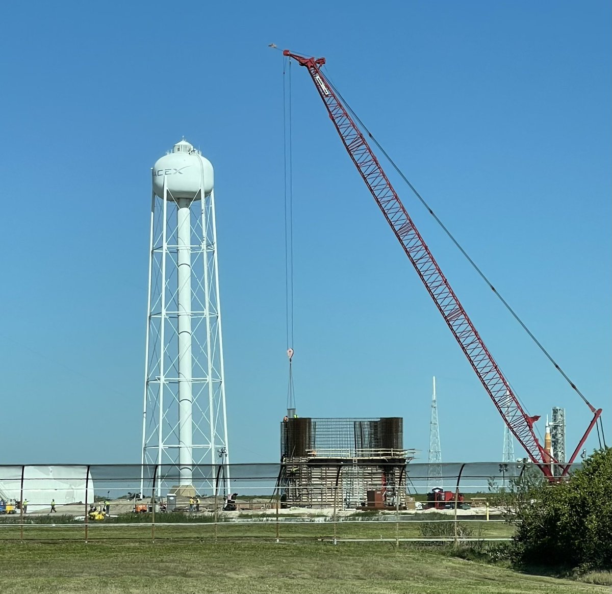 The base and 2 sections of the launch tower is forming. : r/SpaceXLounge