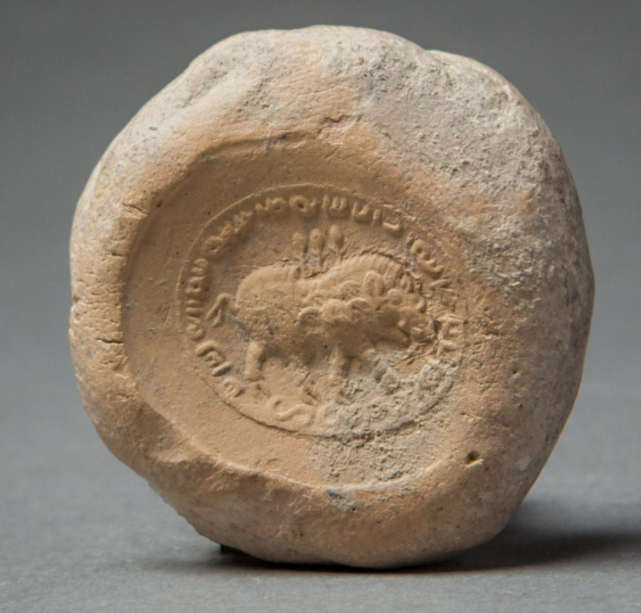 A kuShANa coin showing mithra with a mace: the mace was called a gadha ...