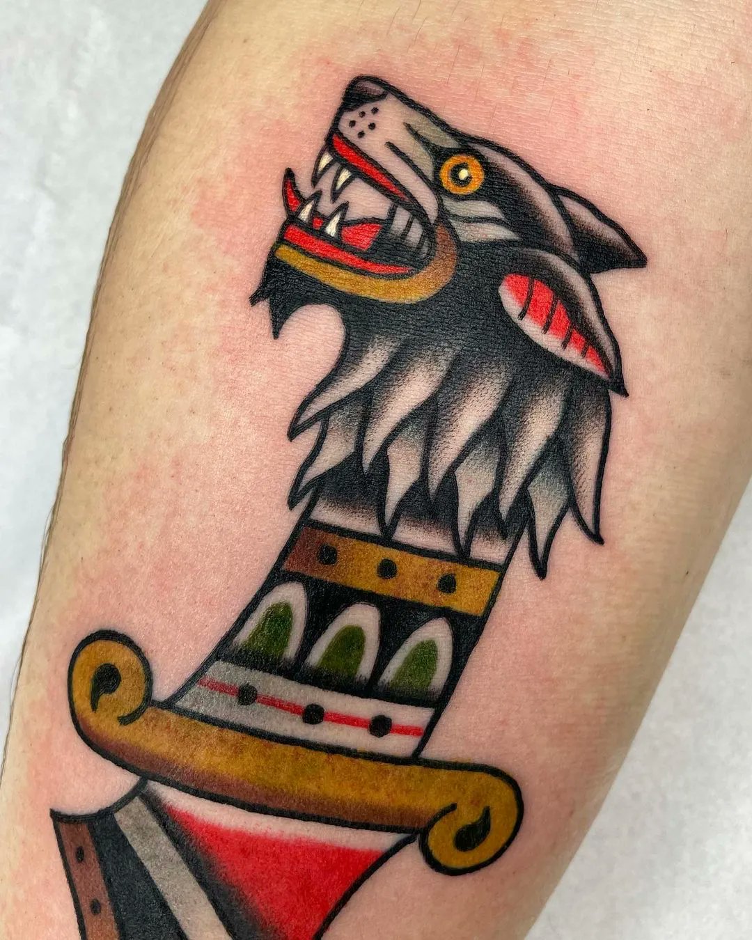 Traditional Wolf Dagger Tattoo