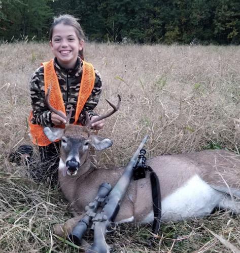 Batavia Daily News on Twitter: "YOUTH HUNTER: Eating oreos while perched in her great ...