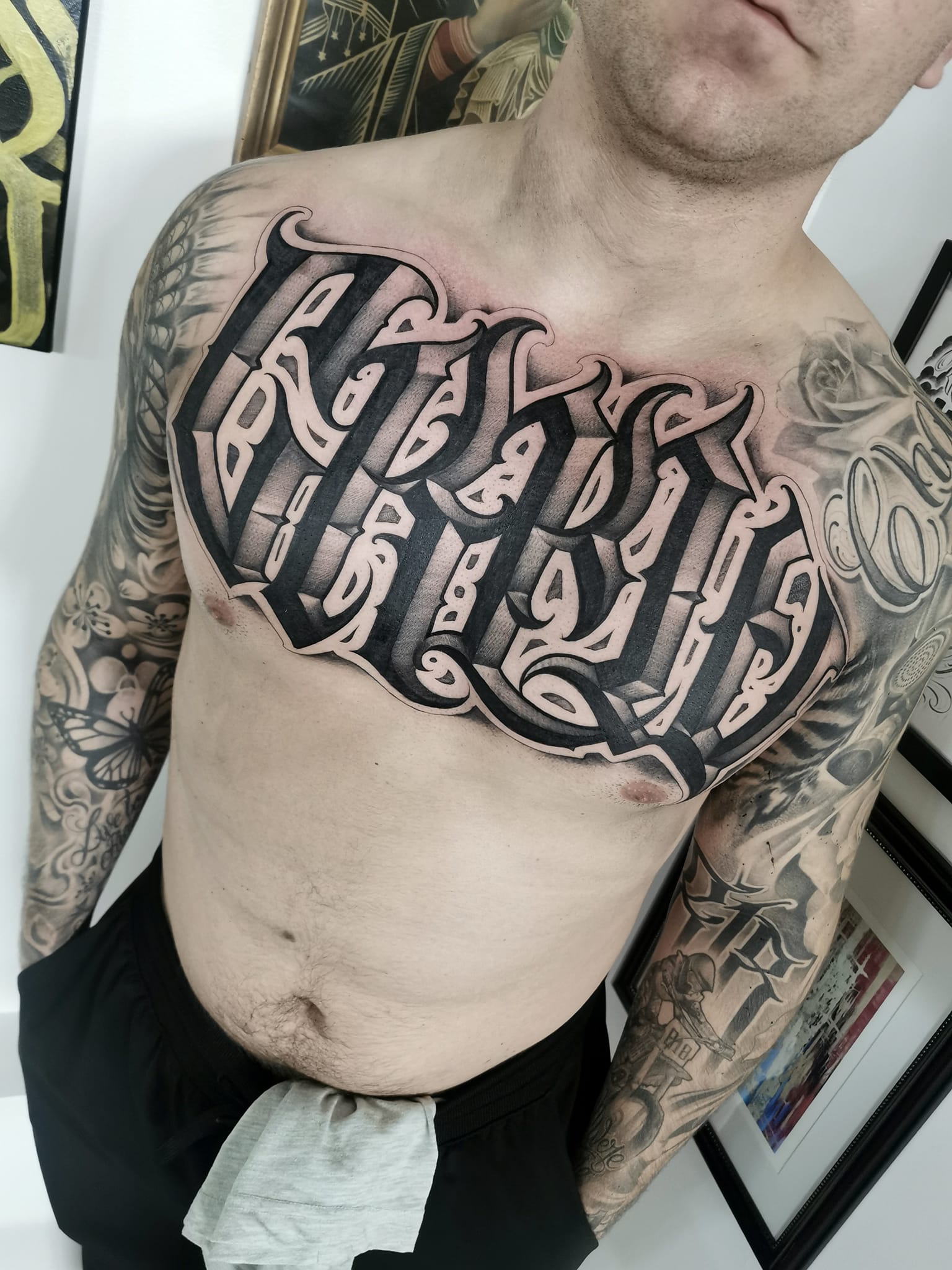 Grey Ink Script Tattoo