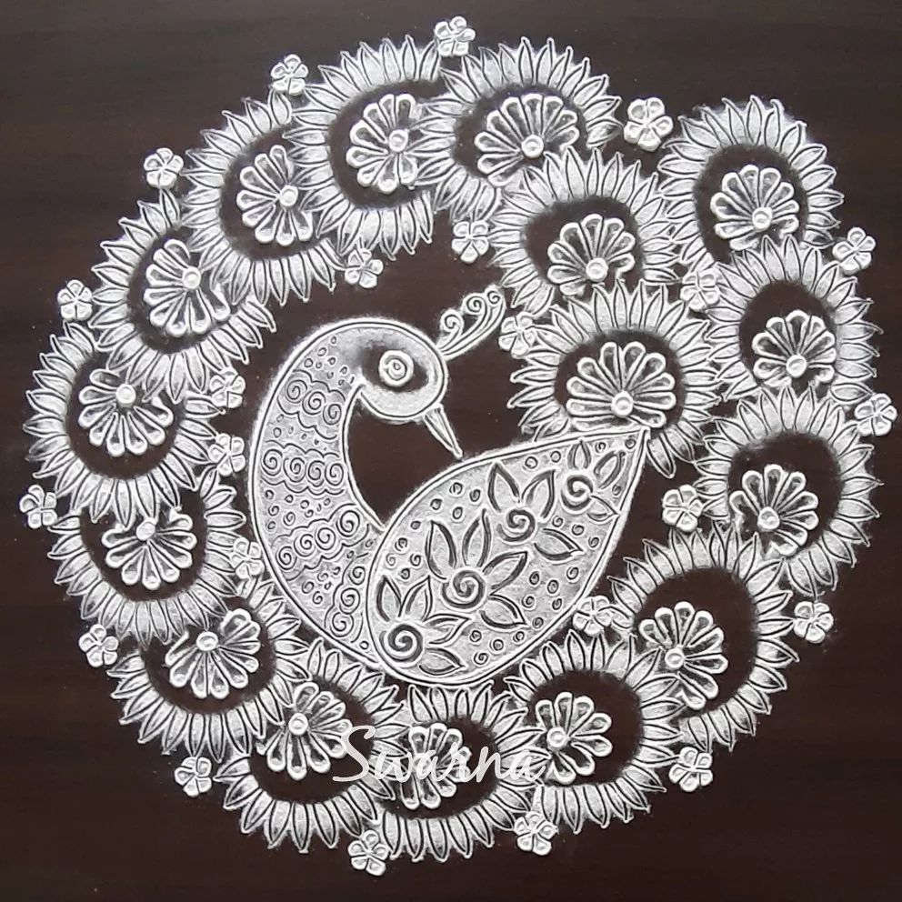 Beautiful Peacock Rangoli Designs