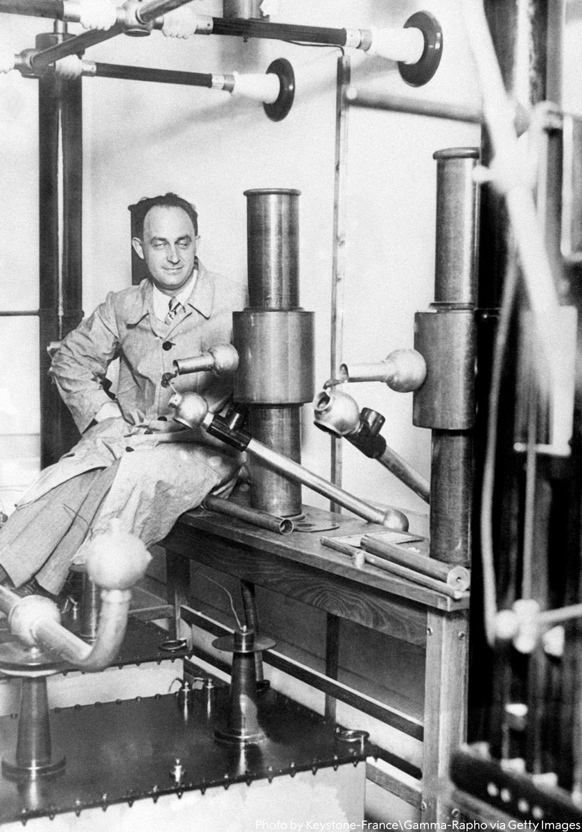 Physicist Enrico Fermi pictured in the laboratory in 1934. Four years ...